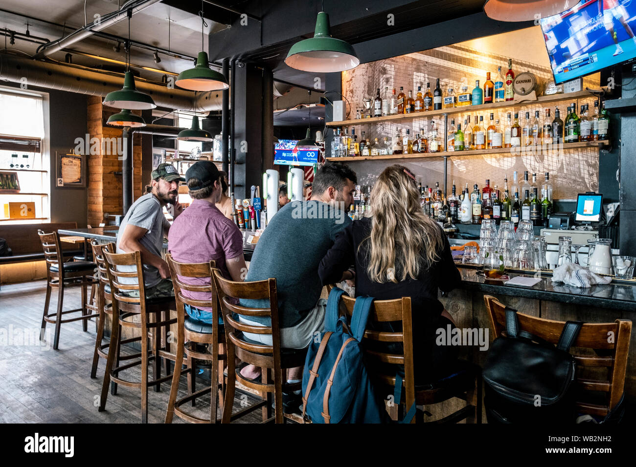 Guys having lunch in a pub, Toronto Stock Photo - Alamy