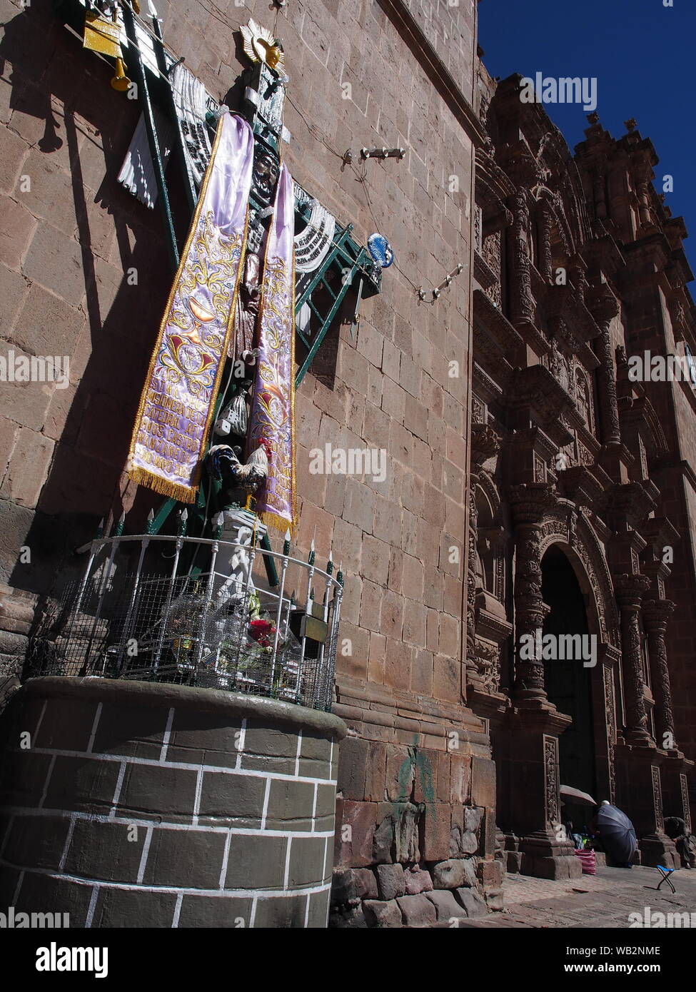 Typical catholic cross for pilgrims, on the facade of the Puno ...