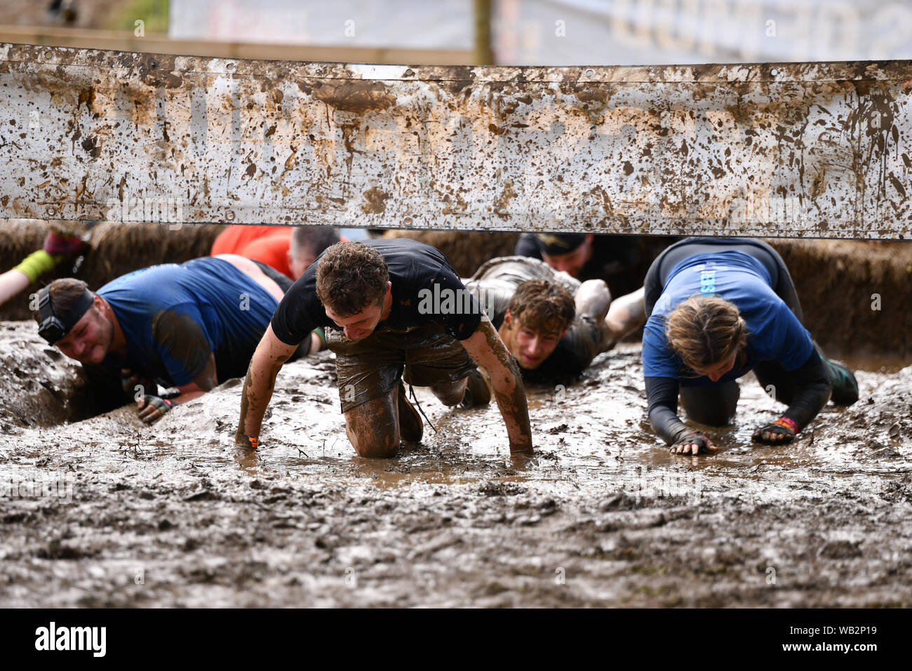 People taking part at a Tough Mudder event in the South West UK Stock ...
