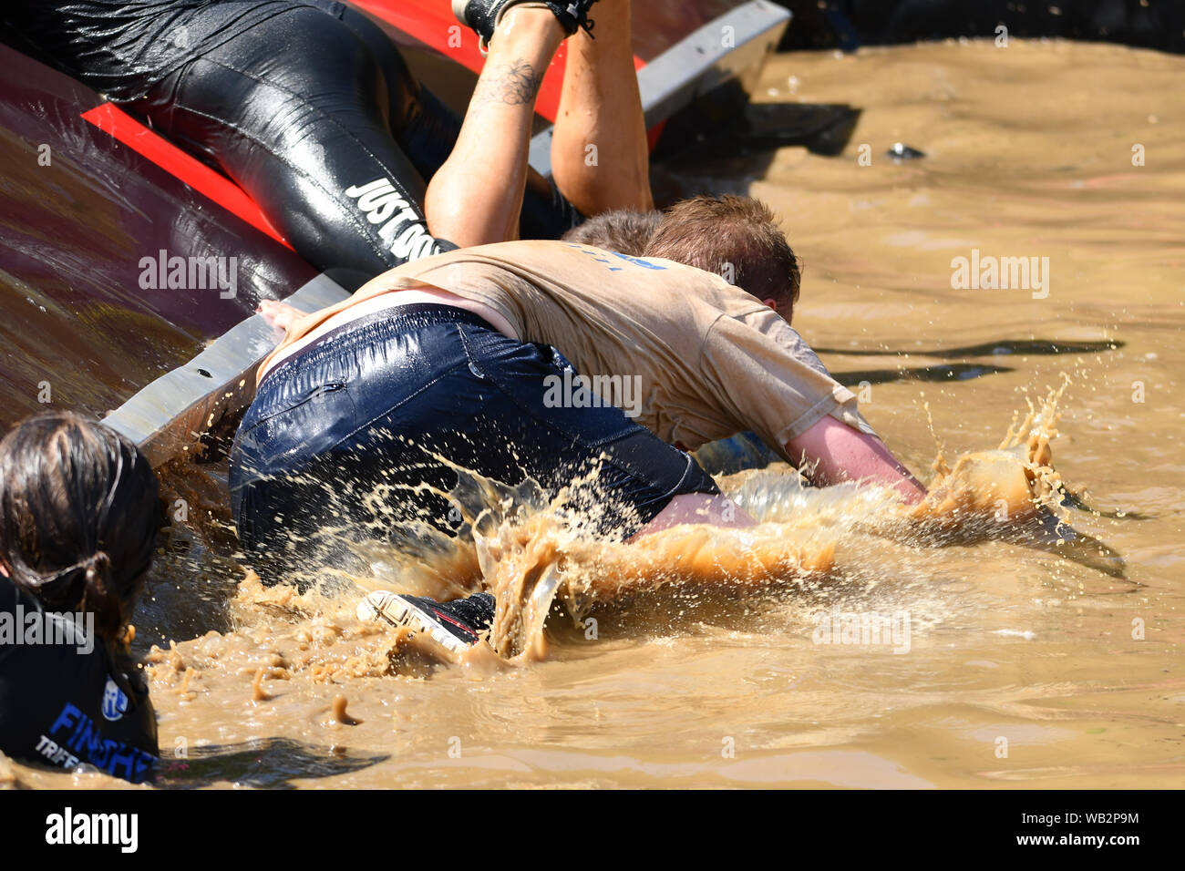 People taking part at a Tough Mudder event in the South West UK Stock ...