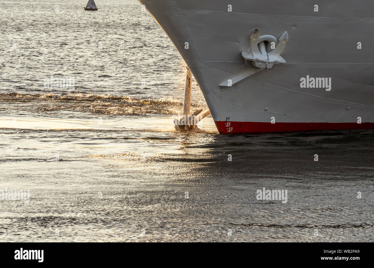 the ship raises the anchor of the water close-up Stock Photo - Alamy