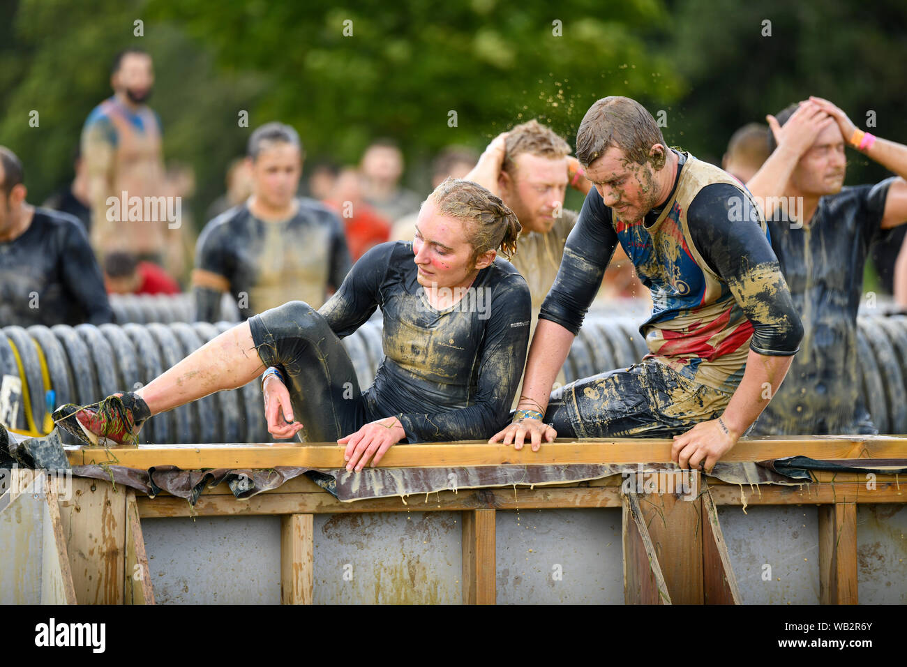 People taking part at a Tough Mudder event in the South West UK Stock ...