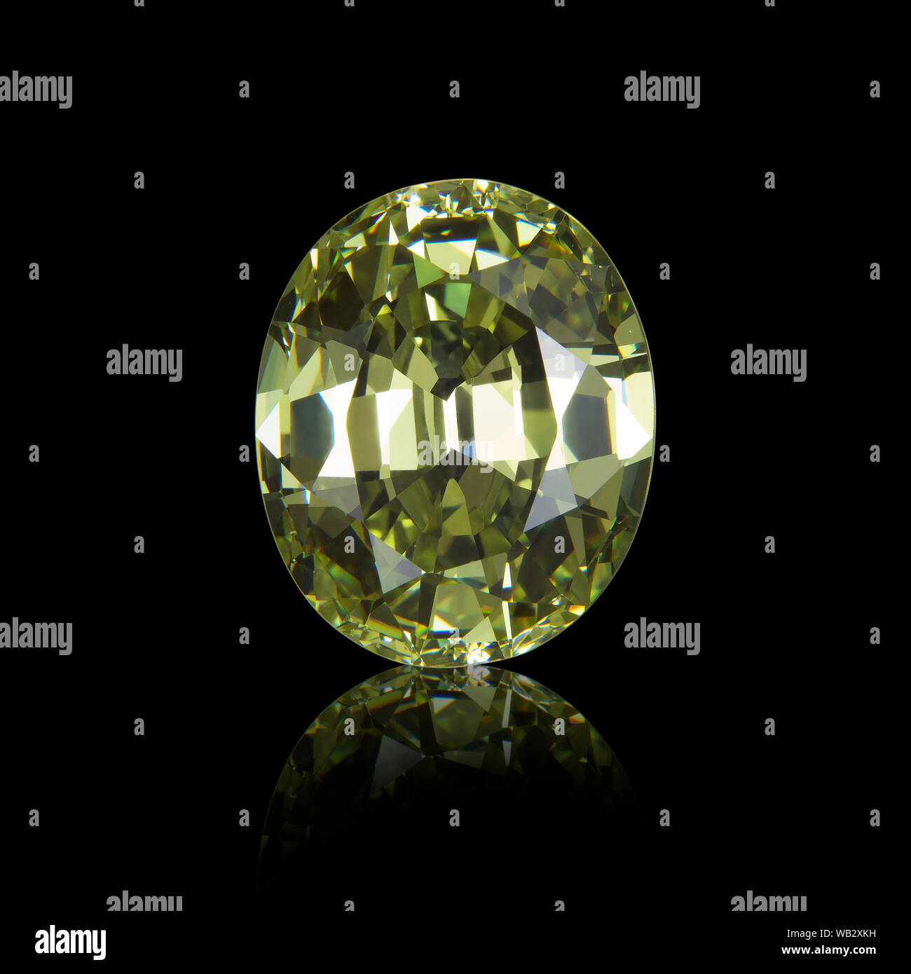 Oval cut peridot Stock Photo - Alamy