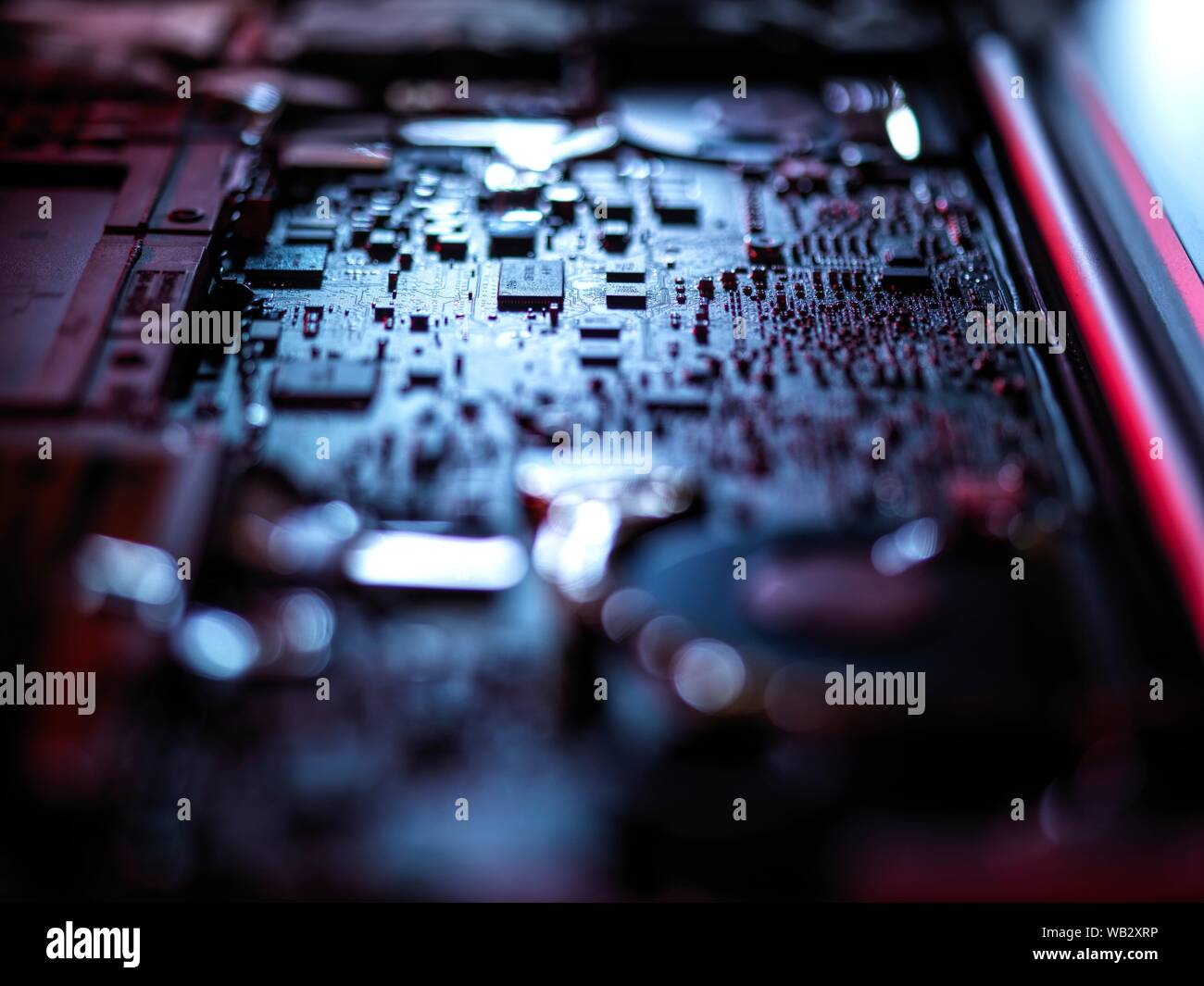 Computer hardware. Interior of a laptop computer showing chips, circuit ...