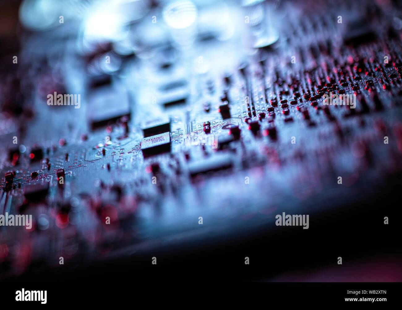 Computer hardware. Interior of a laptop computer showing chips, circuit boards and components ...
