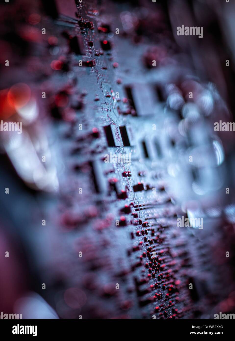 Computer hardware. Interior of a laptop computer showing chips, circuit boards and components ...