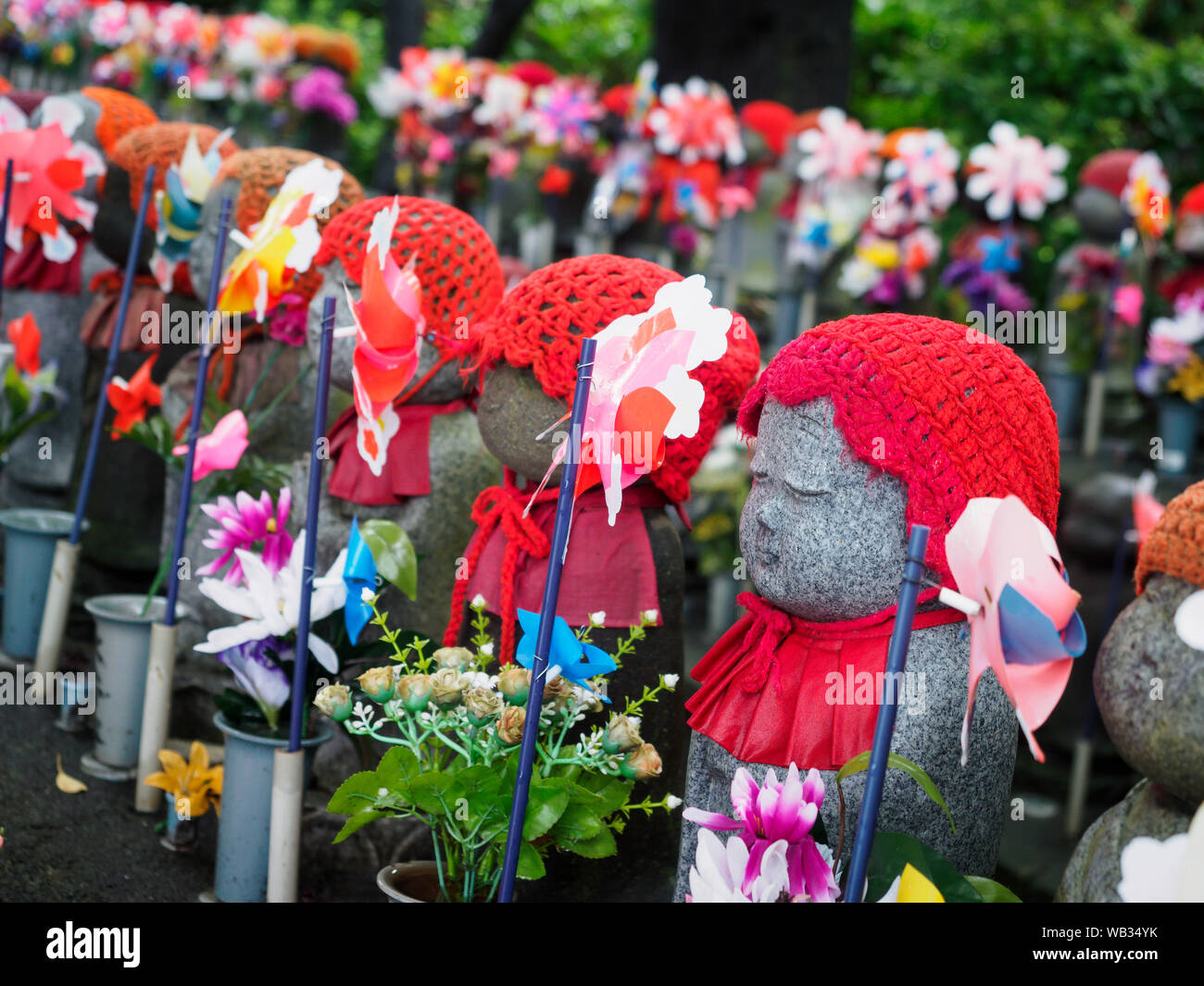 Jizo statues outside a shinto shrine in Japan Stock Photo - Alamy