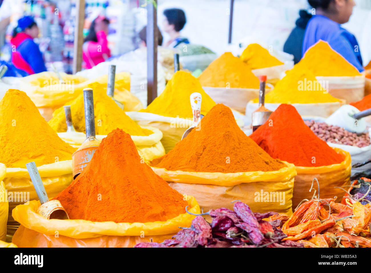 Colorful spices pyramids background. Sucre traditional market, Bolivia ...