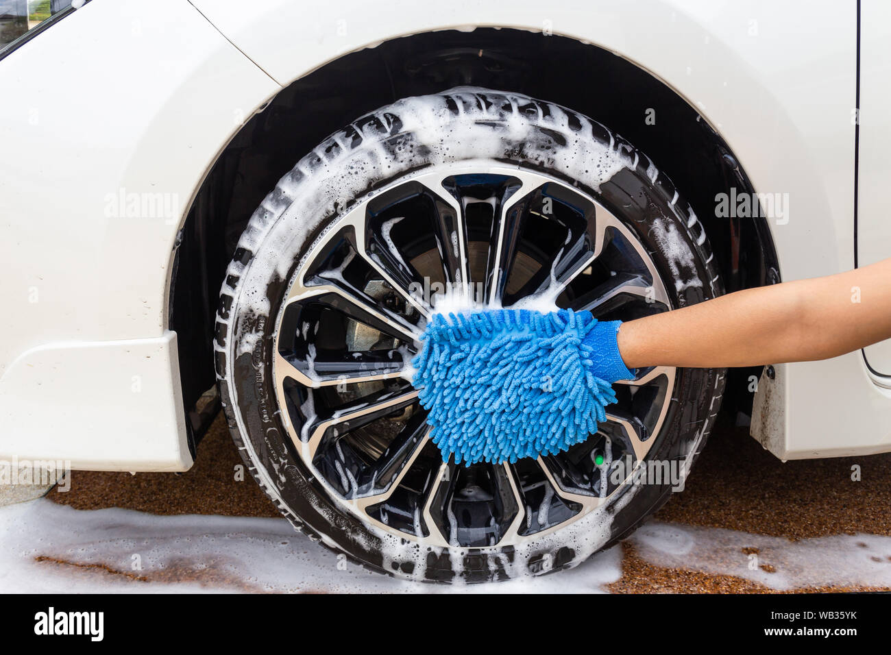 Woman car alloy wheel hi-res stock photography and images - Alamy