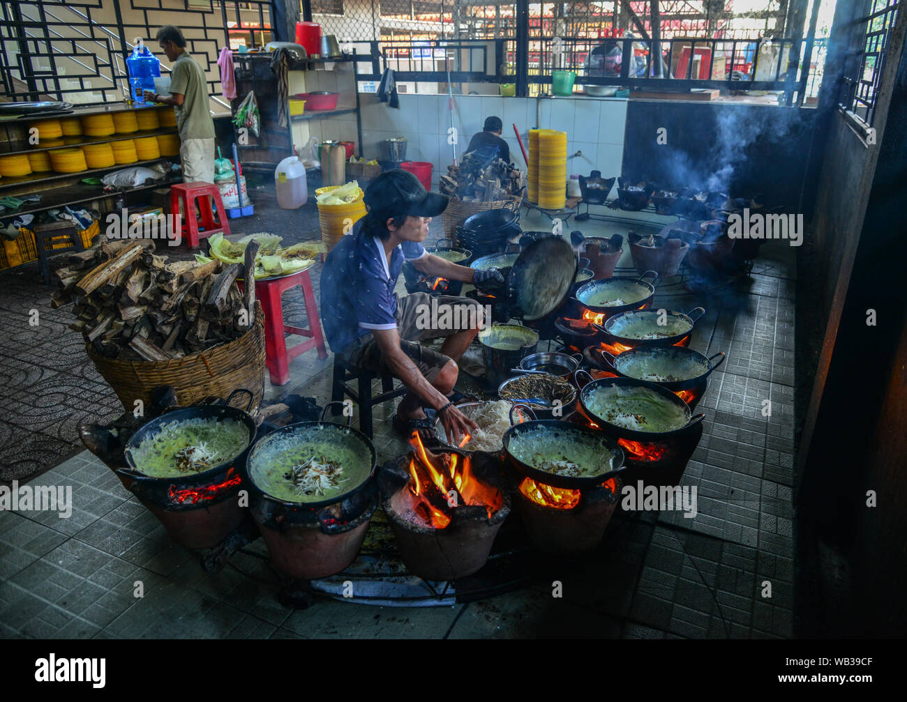 Can Tho, Vietnam - Sep 6, 2017. Cooking sizzling pancake (Vietnamese ...