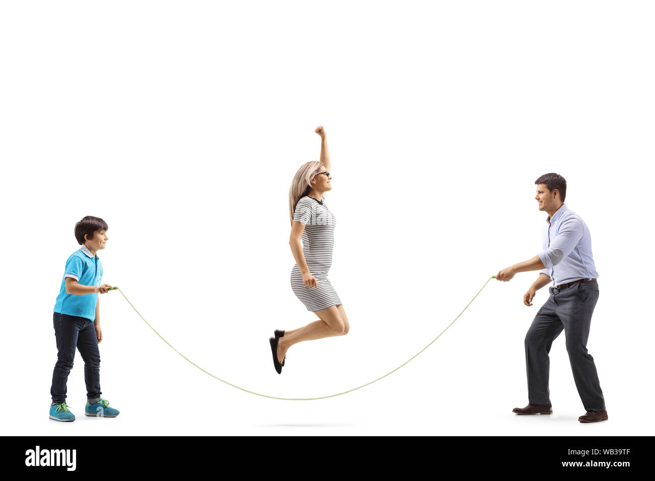 Full length profile shot of a father and son holding a rope and a ...