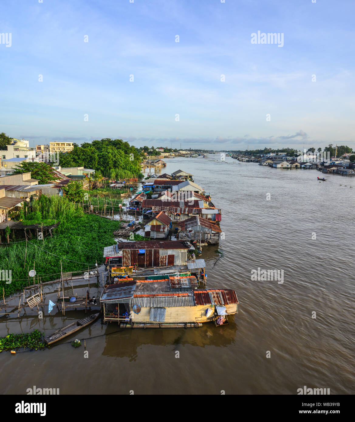 Floating houses on Mekong River in Chau Doc, Vietnam. Chau Doc is a ...