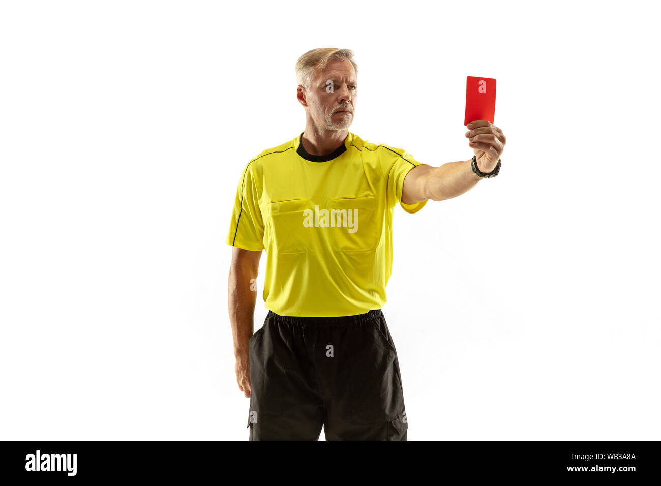 Referee showing a red card to a displeased football or soccer player ...