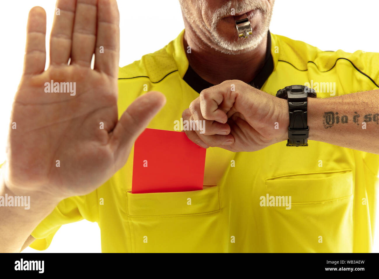 Referee showing a red card to a displeased football or soccer player ...