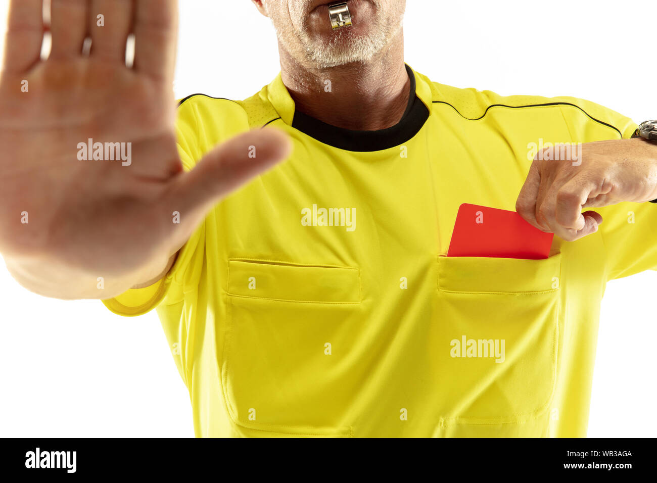 Referee showing a red card to a displeased football or soccer player ...