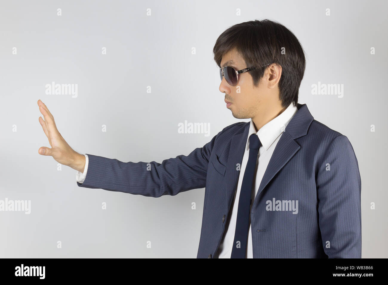 Young Asian Portrait Businessman in Navy Blue Suit with Stop Hand Pose ...