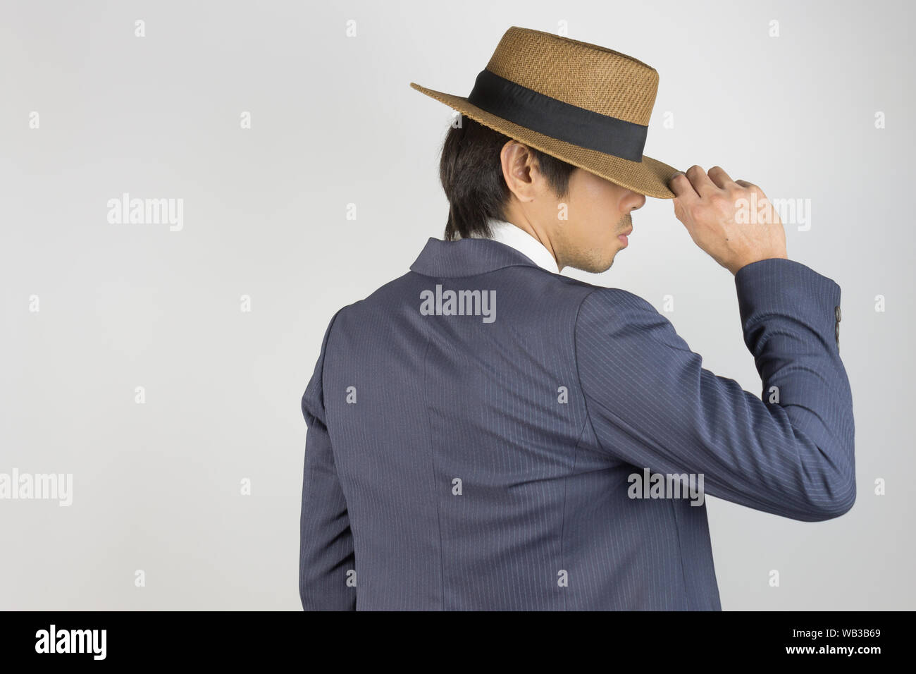 Young Asian Portrait Businessman in Navy Blue Suit Touch Hat at Back ...