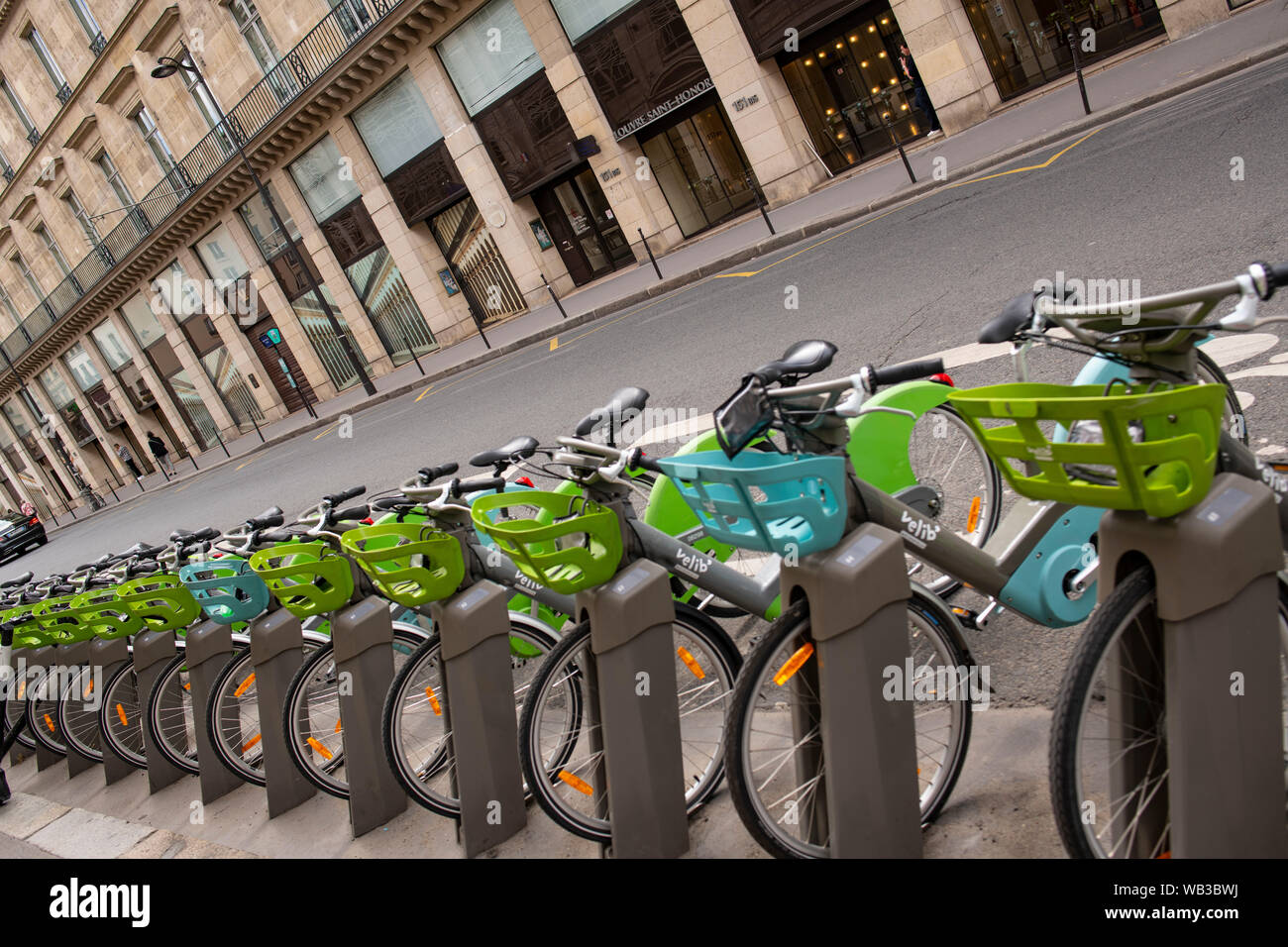Parked Bicycles for rent on racks on urban city street, view of bike ...