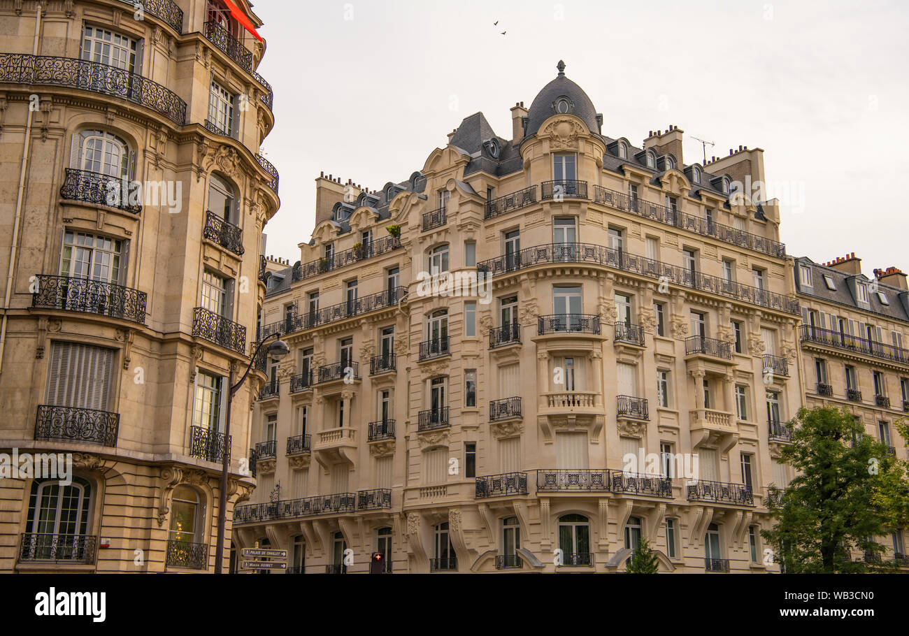 Eiffel tower between Parisian tenement old street alley and buildings ...