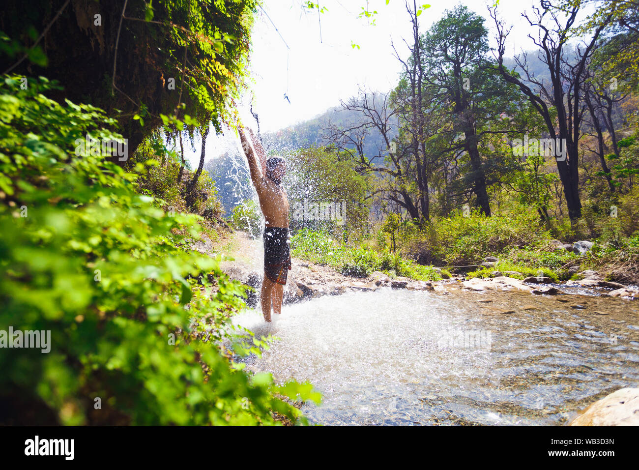Boy falling water hi-res stock photography and images - Alamy