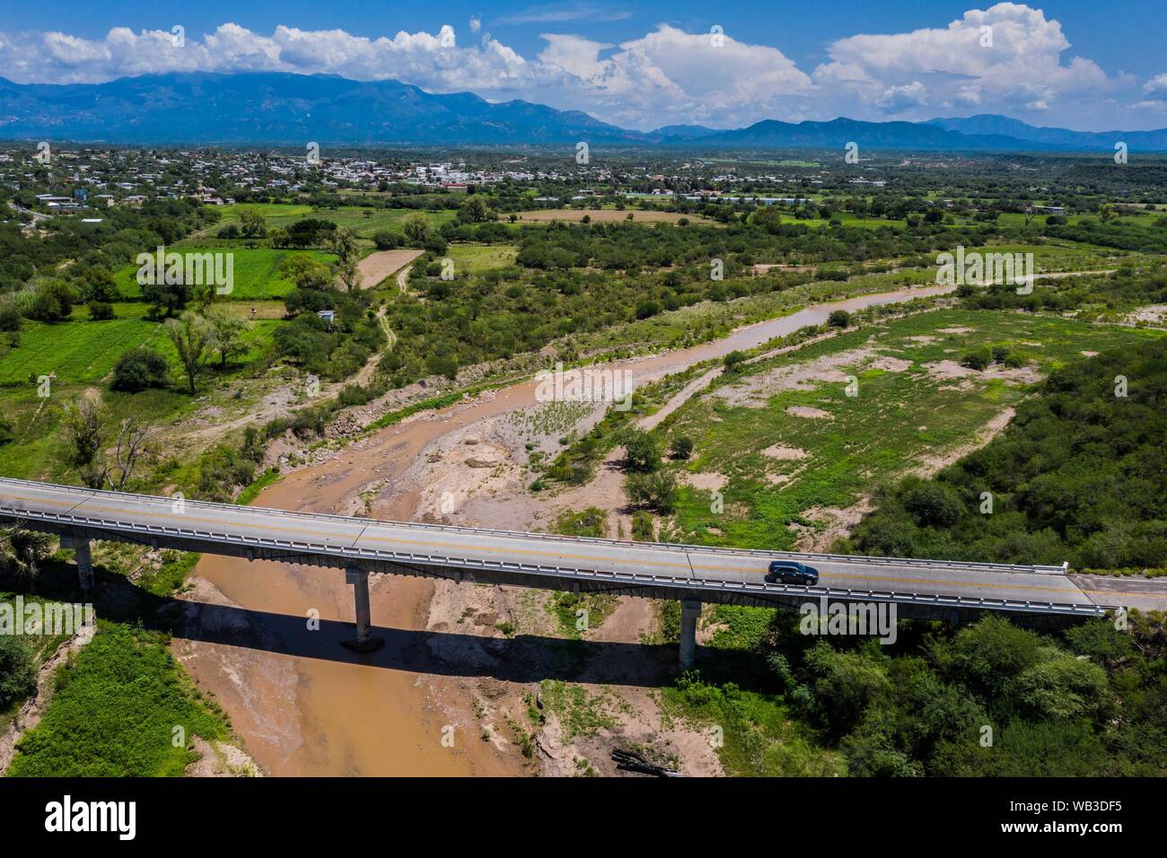 Aerial view of the bridge and road that crosses the river. Entry and ...