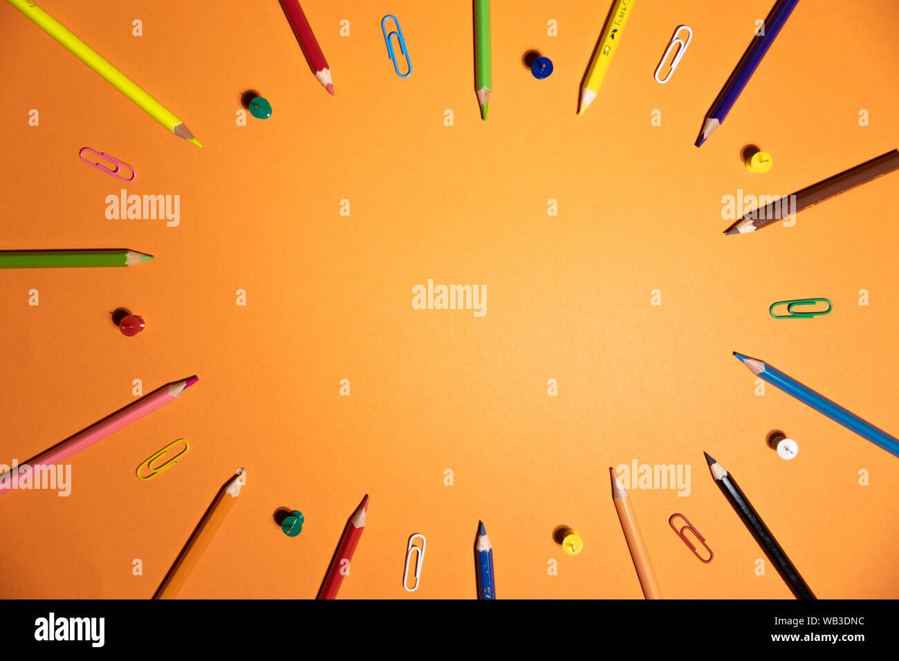 School supplies on yellow board background. Education, back to school ...
