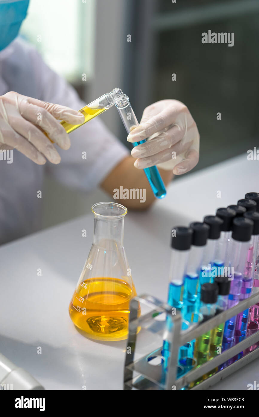 Scientist doing chemical test in laboratory Stock Photo - Alamy