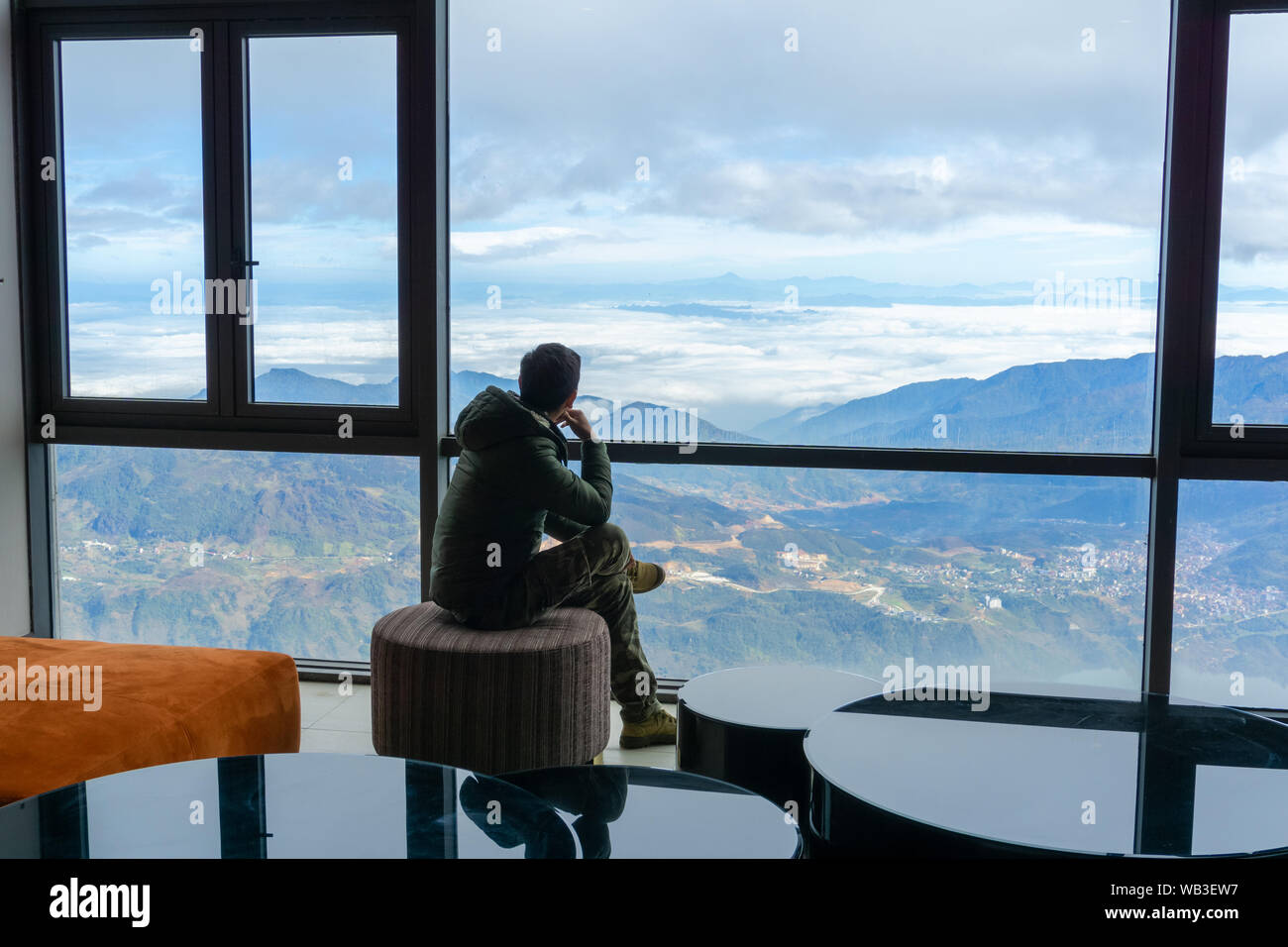 Hotel room with mountain landscape view from window, interiors with ...