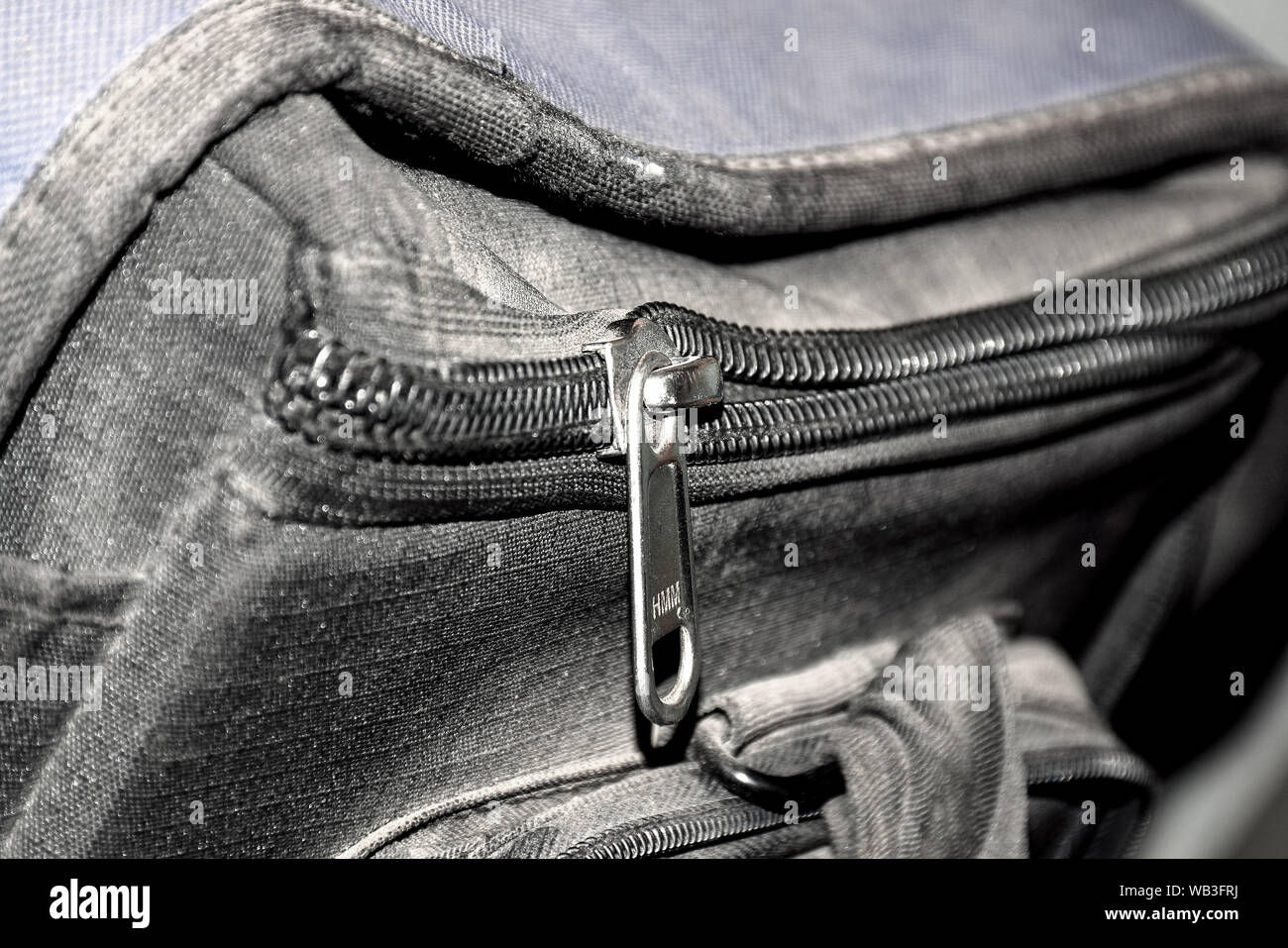 old bag with open zipper Stock Photo - Alamy