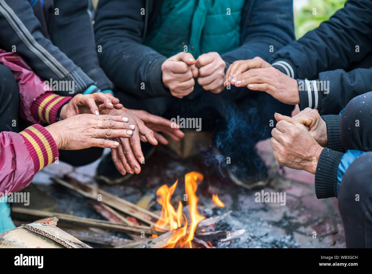 Children Sitting Around Fire High Resolution Stock Photography and ...