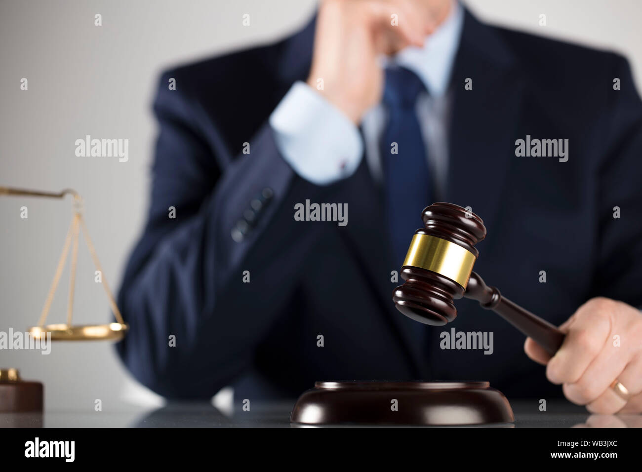 Attorney at law with antique wooden mallet. Legal counsel office. Place ...