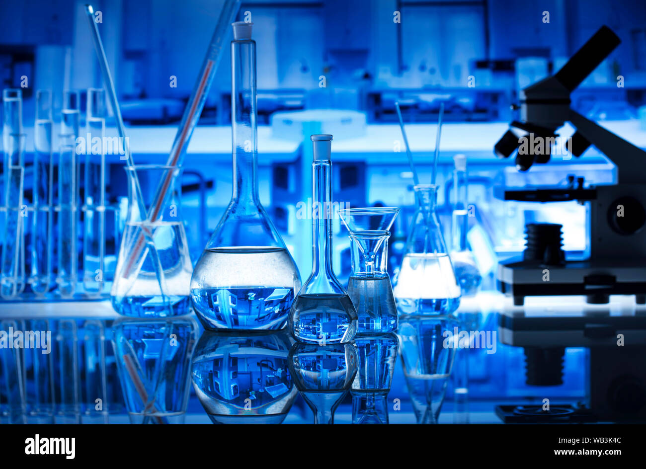 Science laboratory concept background. Microscope and laboratory ...