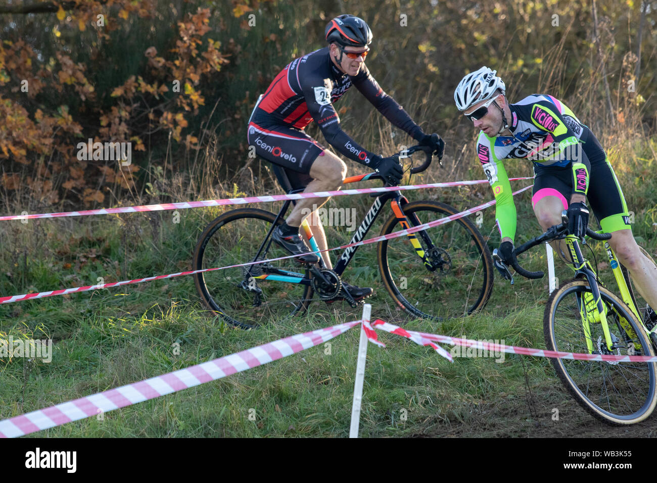 Two cyclocross riders on a sharp course turn Stock Photo - Alamy