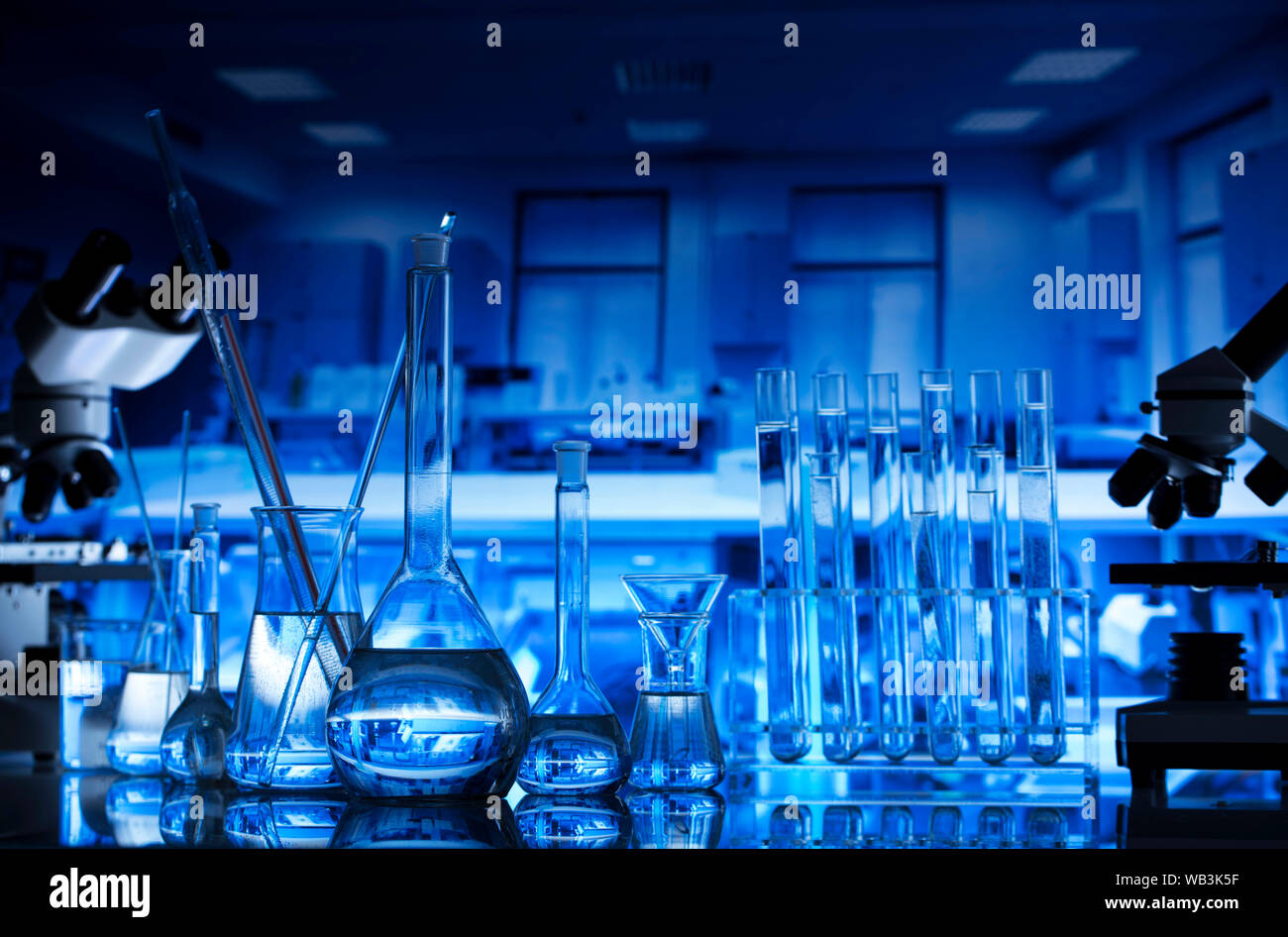 Science laboratory concept background. Microscope and laboratory ...