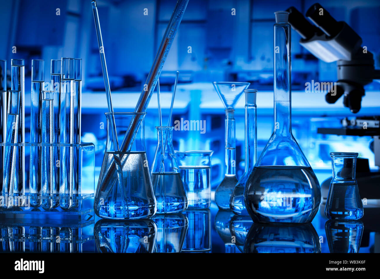 Science laboratory concept background. Microscope and laboratory ...