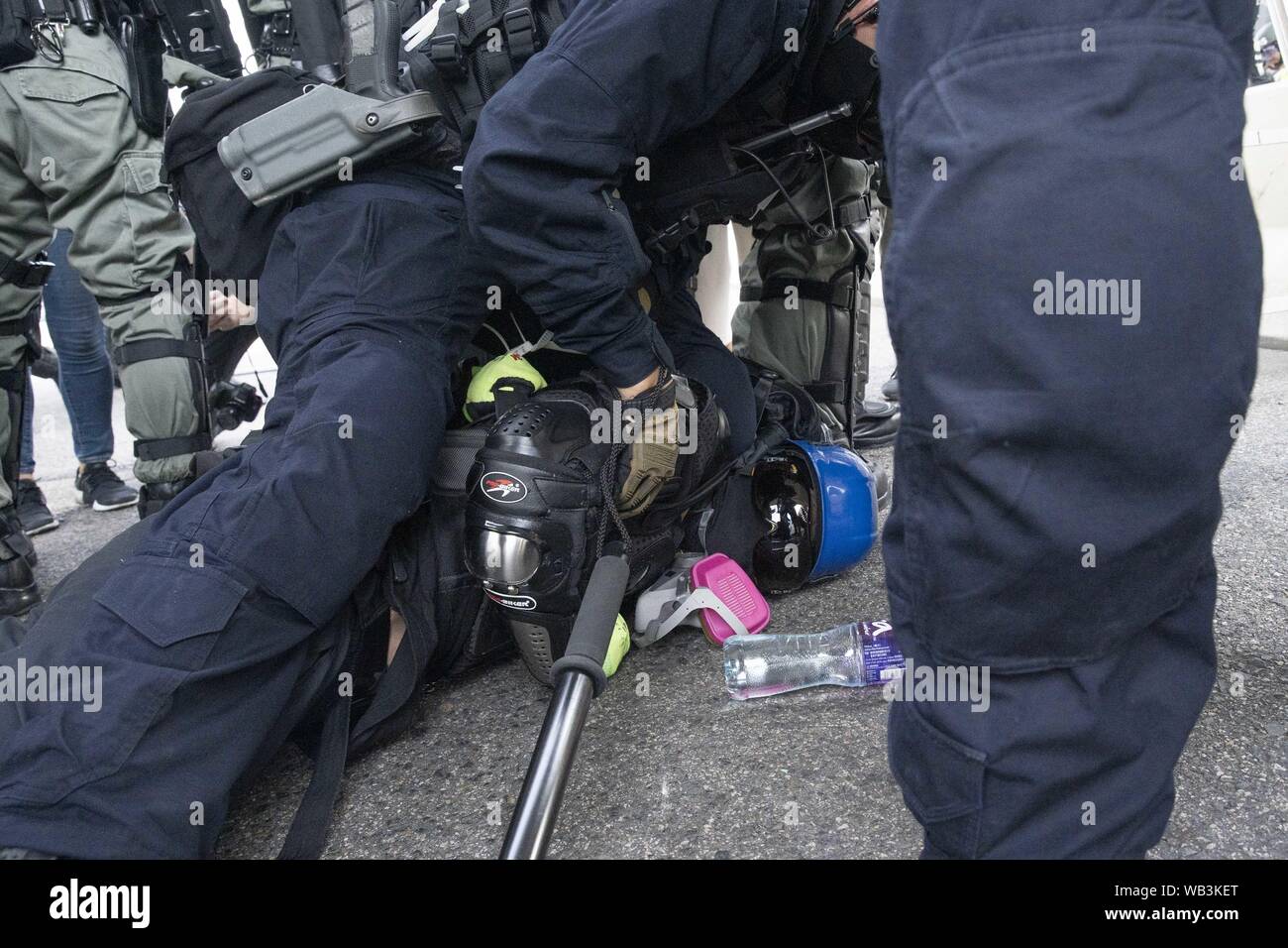Throwing objects at police hi-res stock photography and images - Alamy