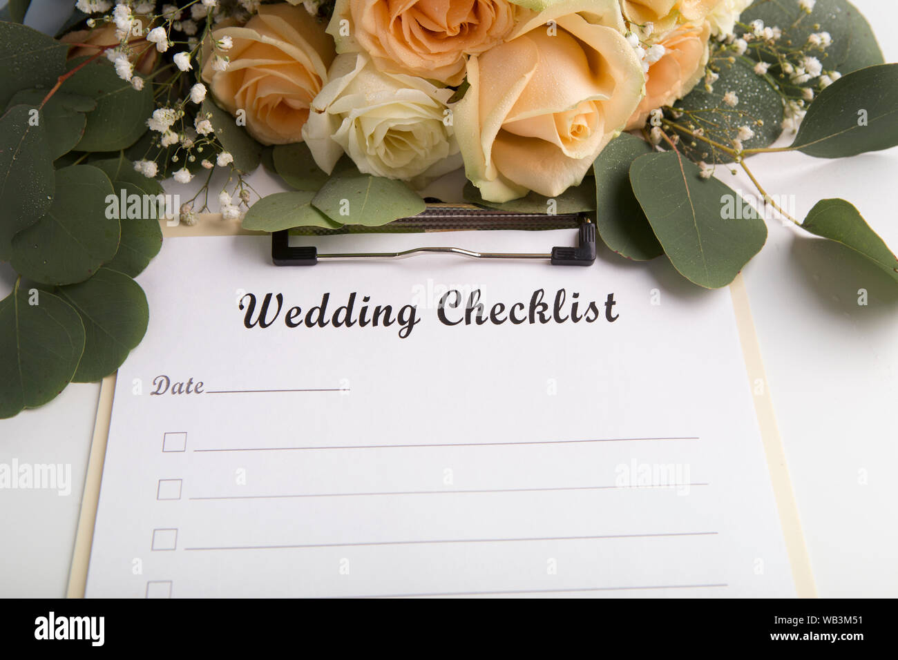 Wedding checklist with empty space for text and roses Stock Photo - Alamy