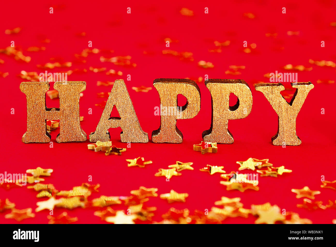 Text Happy laid out of gold letters on a beautiful background. Golden ...