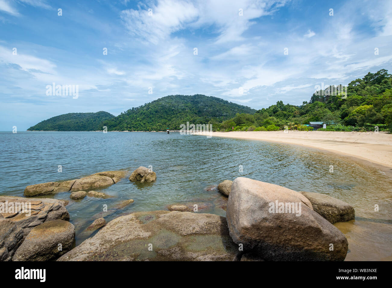 Penang island beach next to the tropical rain forest of Penang Stock ...