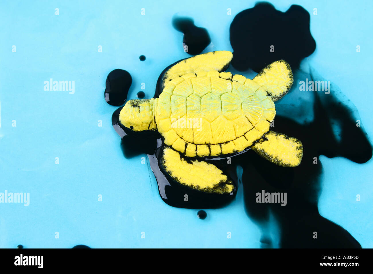 Turtle in oil. pollution in ocean environmental problem. Ecological ...