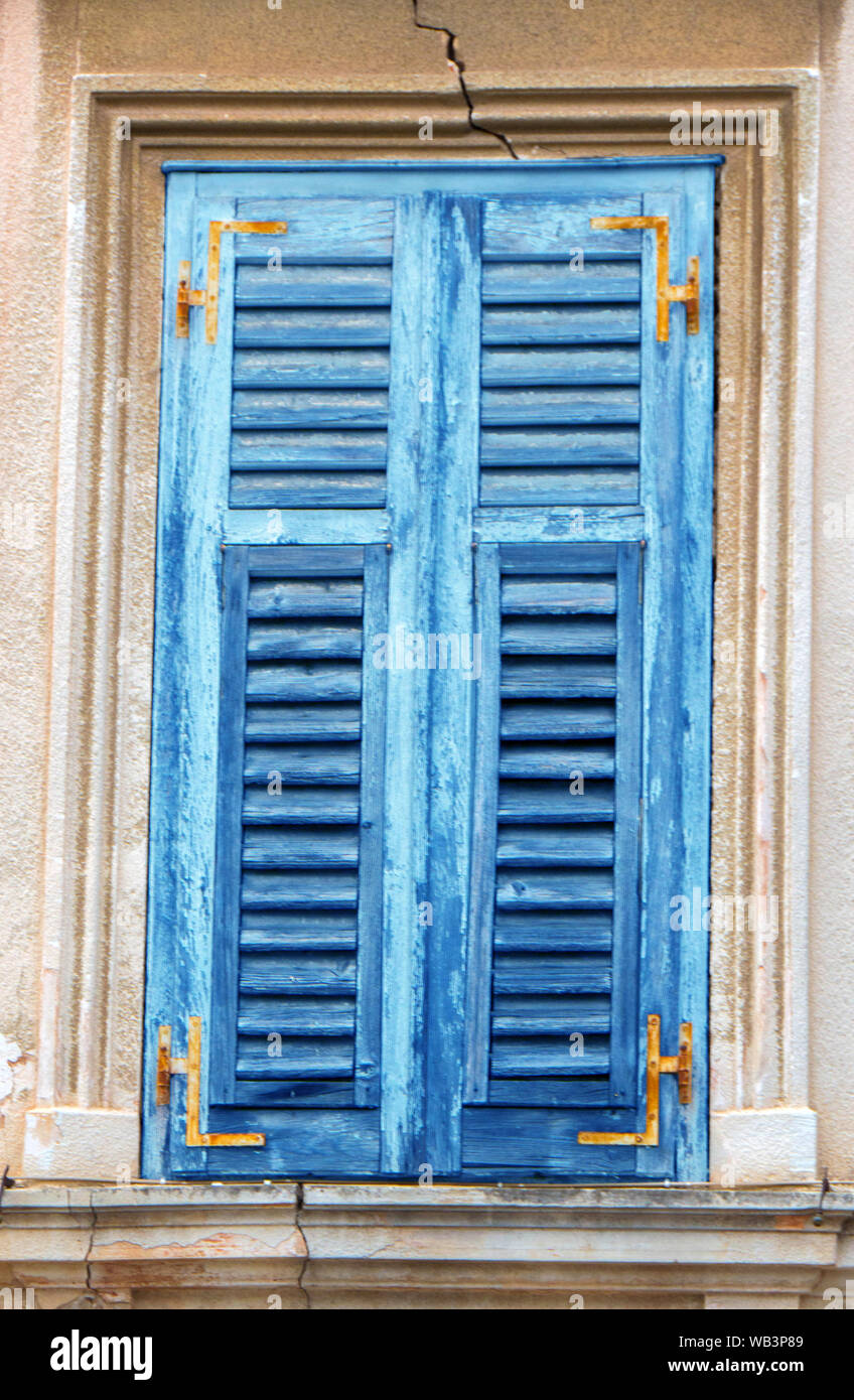 Rustic window with wooden shutters hi-res stock photography and images ...