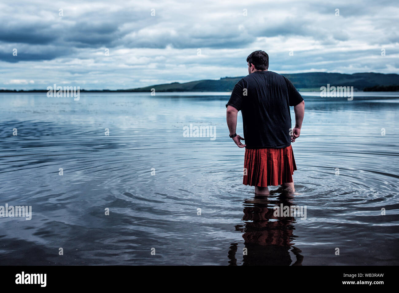 Kilted Man wading in Loch Leven Stock Photo - Alamy