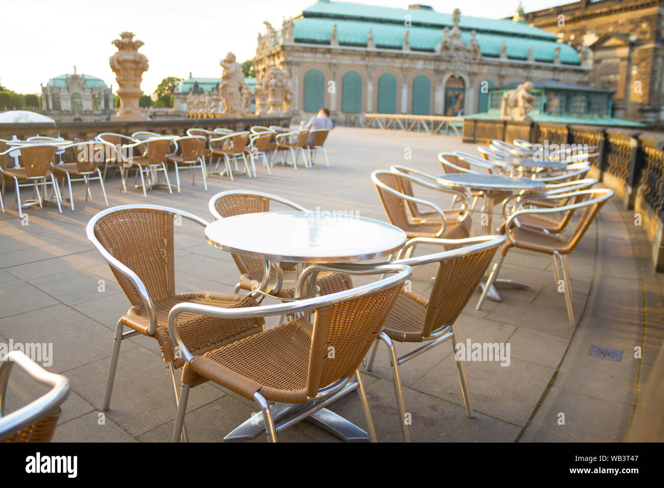 Street cafe with brown tables and chairs Stock Photo - Alamy