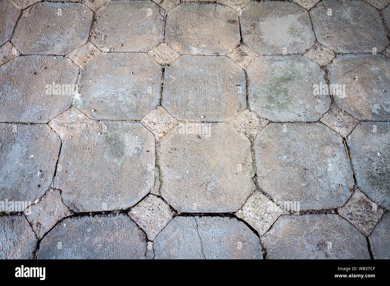Old concrete tiles in the walkway. Abstract architecture background ...