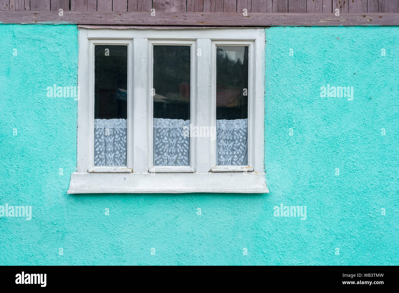 Windows of a rural house. Facade of a house. Exterior view. Rural scene ...