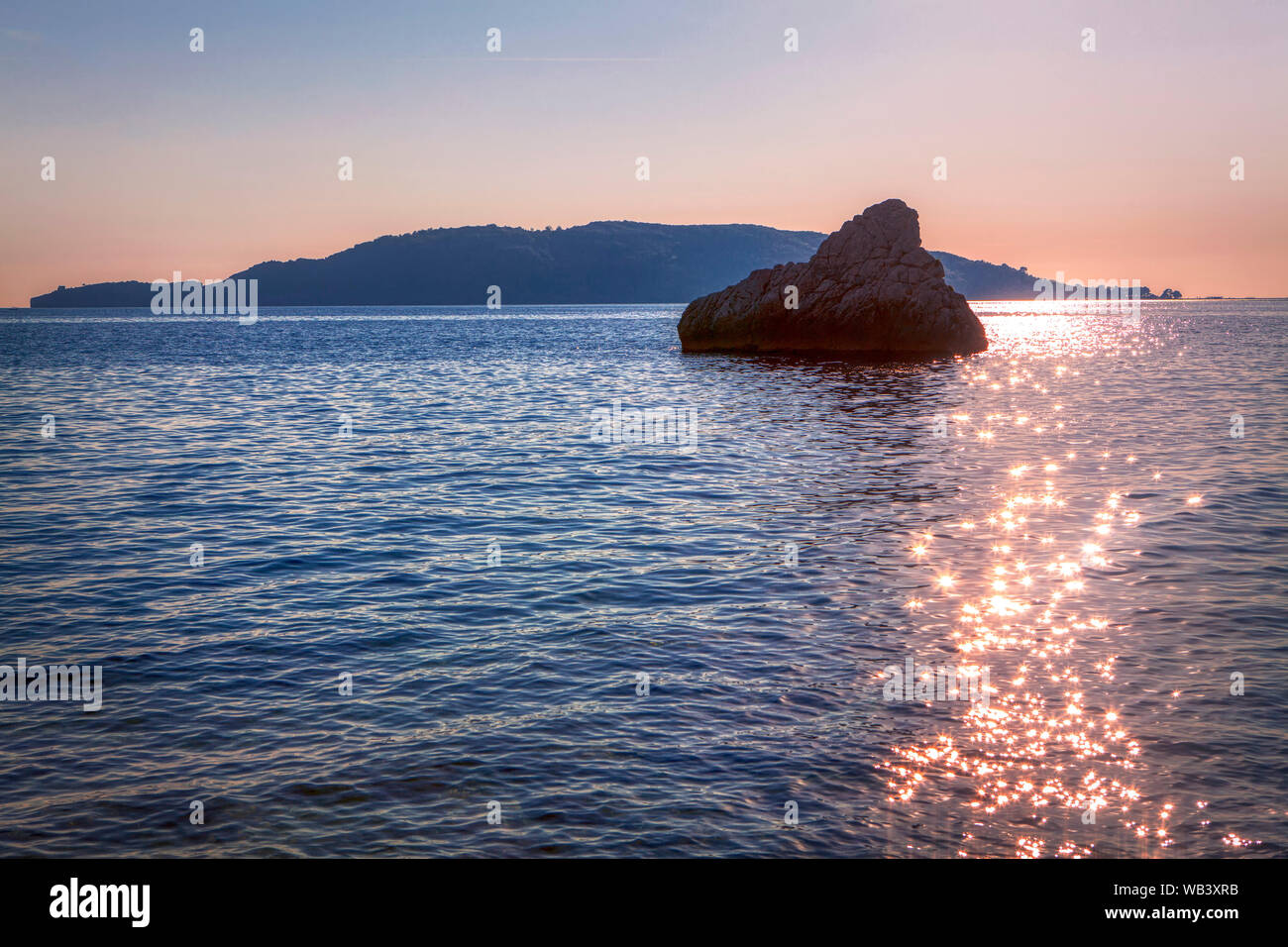 tropical island in the sunset Stock Photo - Alamy