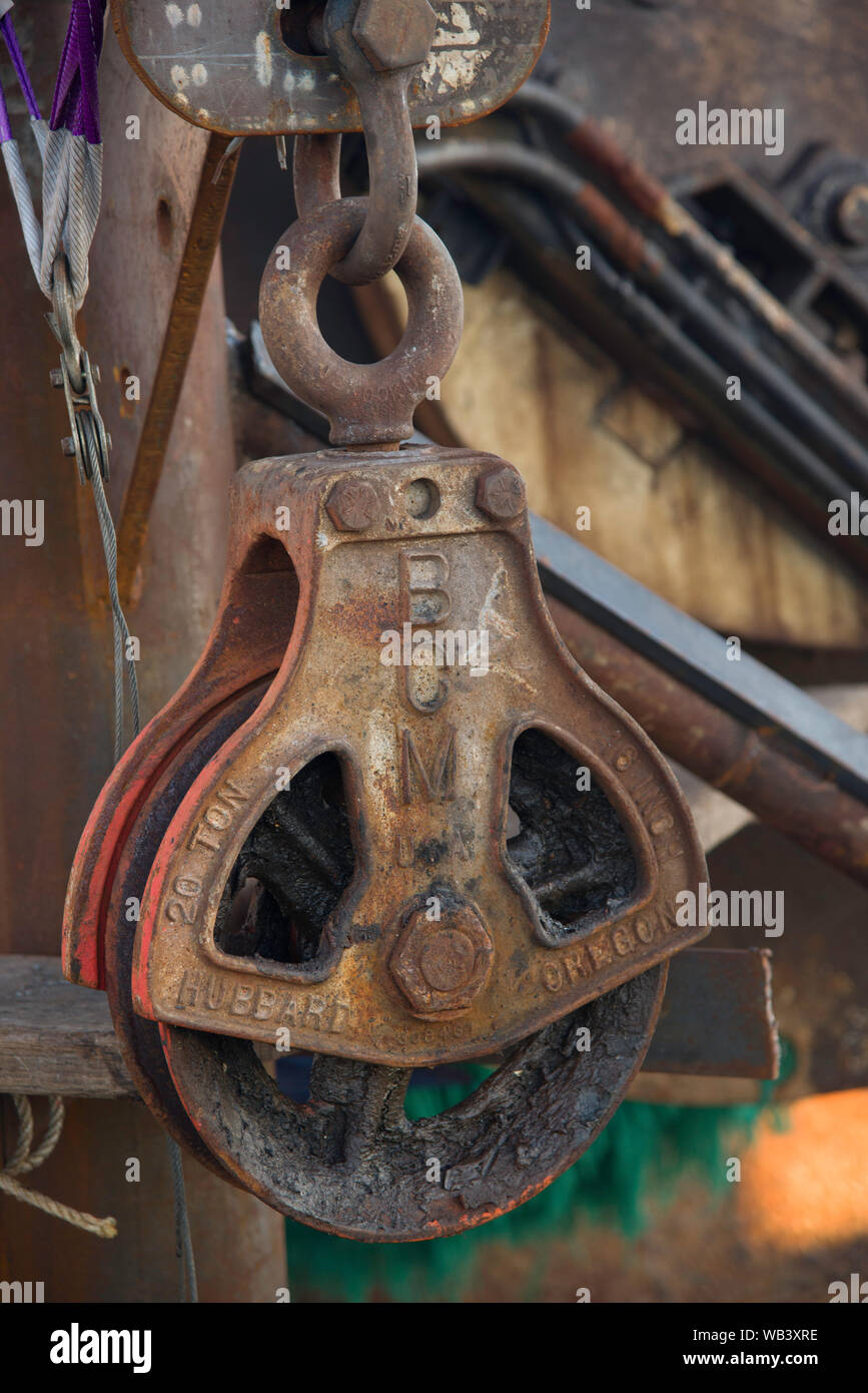 Rusty pulley on an old trawler in Gloucester Stock Photo - Alamy