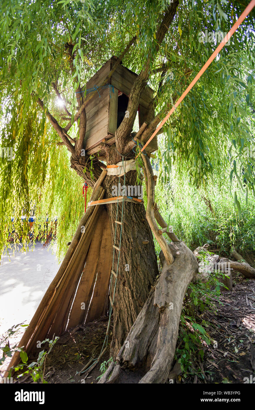self made wooden treehouse for kids Stock Photo - Alamy