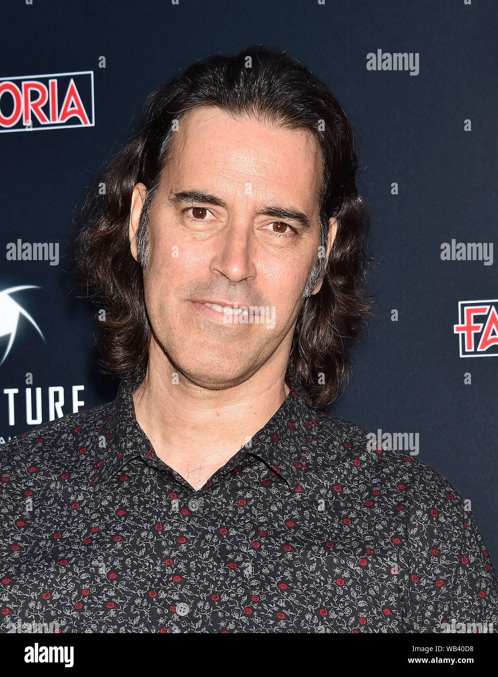 HOLLYWOOD, CA - AUGUST 23: Jeff Daniel Phillips arrives at the premiere ...