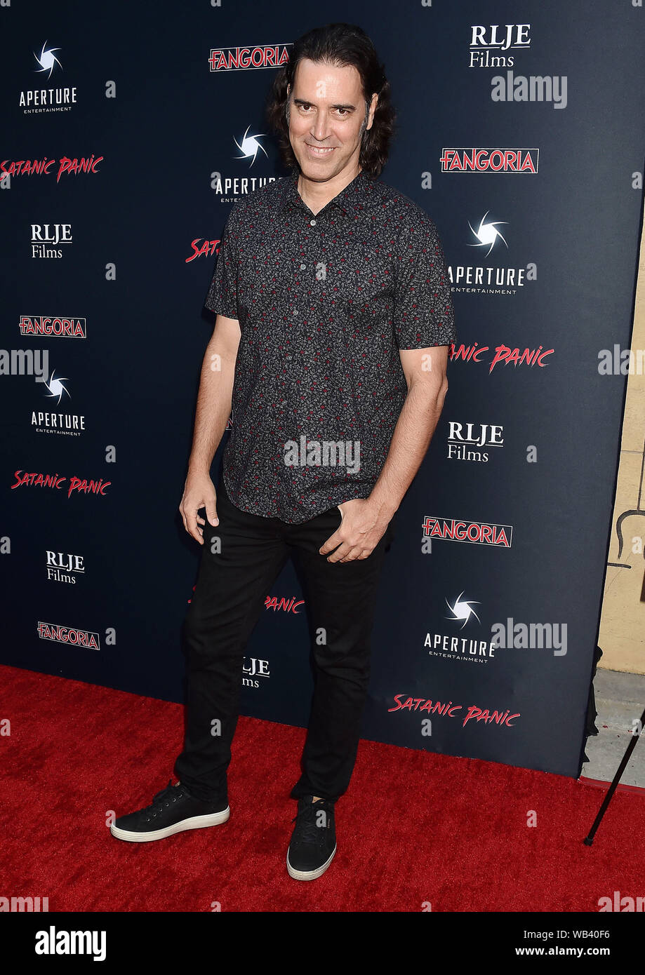HOLLYWOOD, CA - AUGUST 23: Jeff Daniel Phillips arrives at the premiere ...